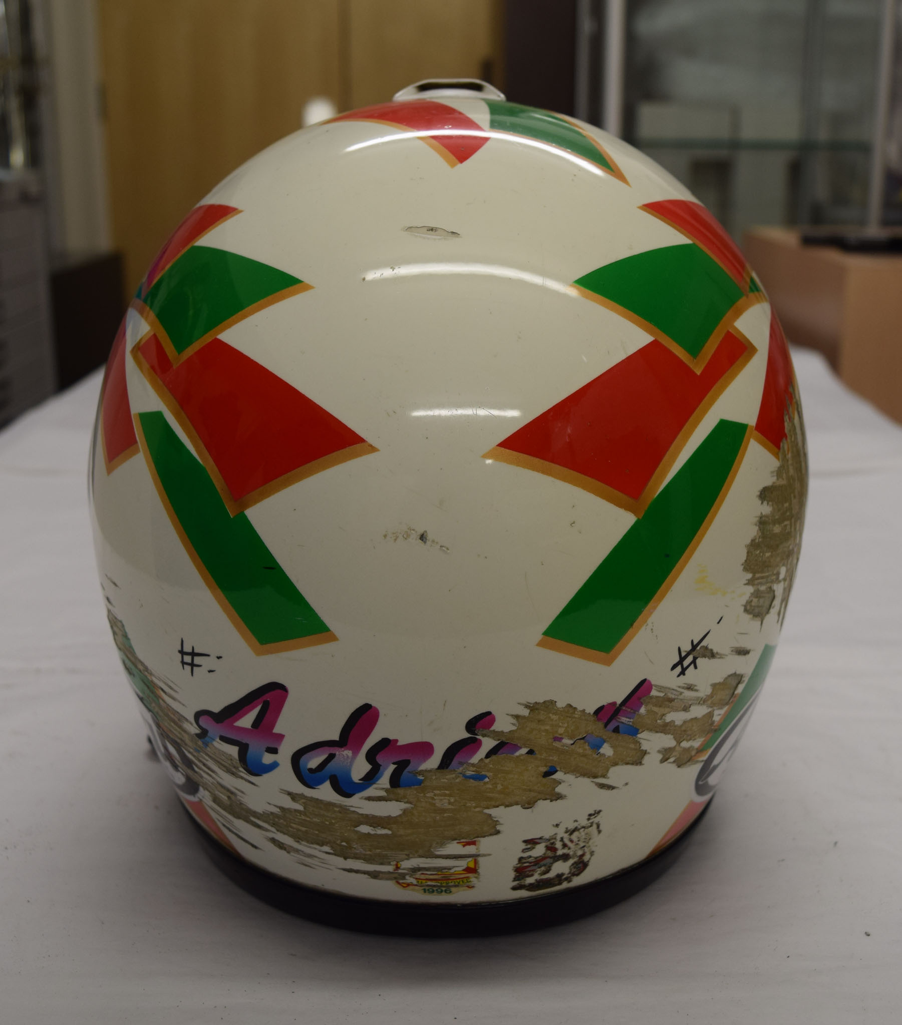 Arai motorcycle helmet belonging to Adrian McFarland. White helmet with ...