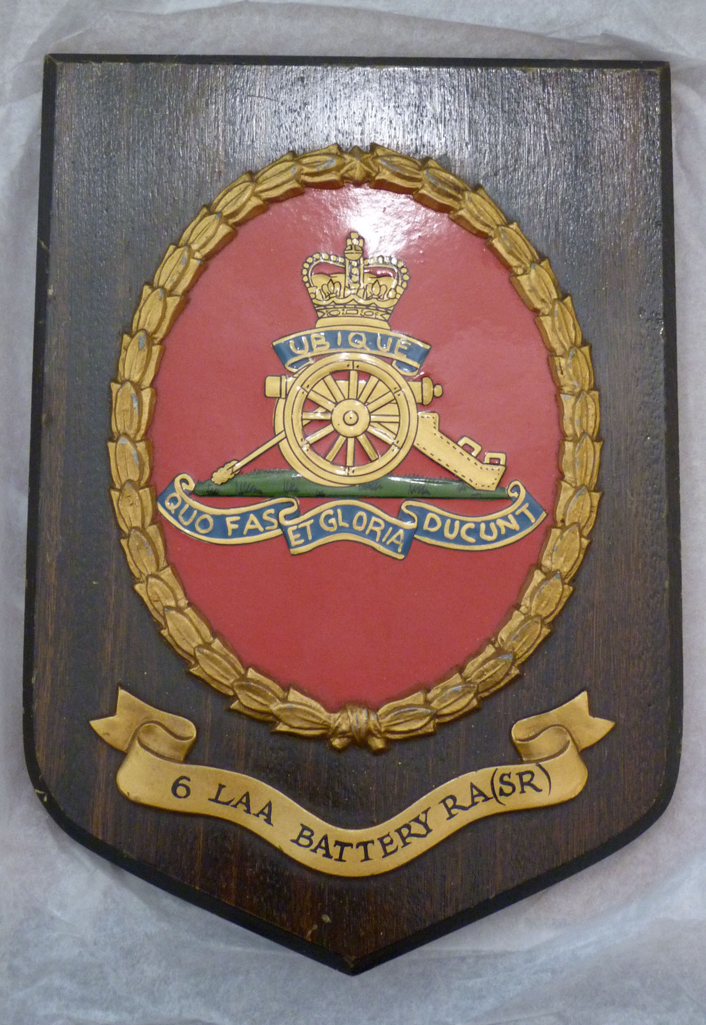 6 LAA Battery RA(SR) crest. Brown wooden shield with Royal Artillery ...