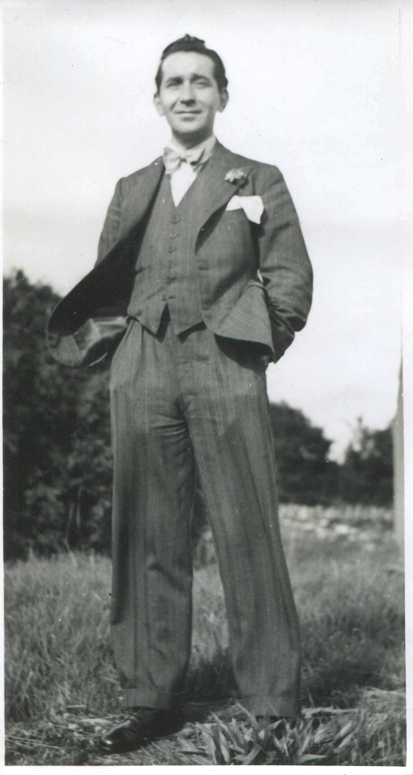 James McCafferty standing with his hands in his pockets. Typed caption ...