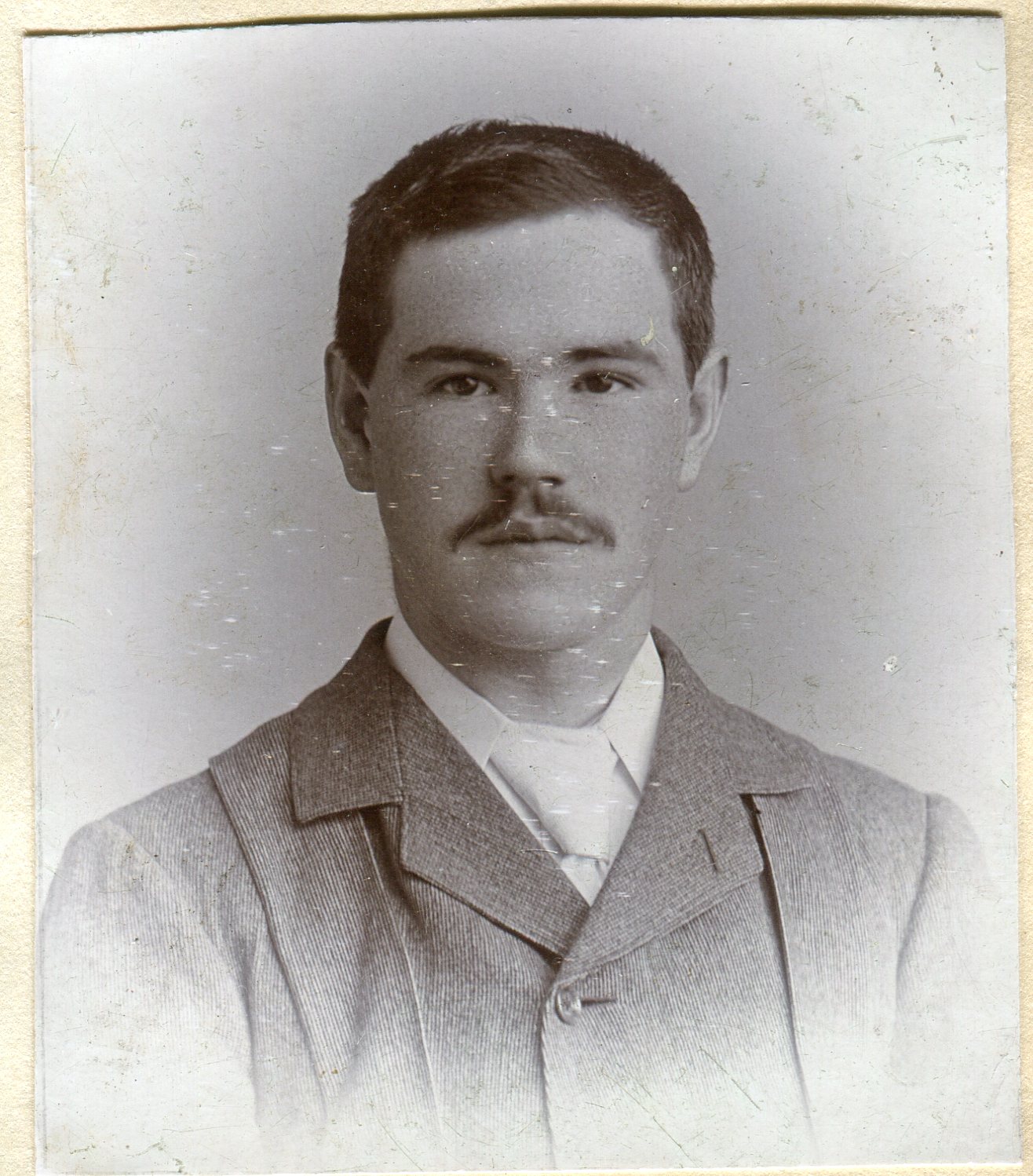 Black and white portrait photographic of Sam Henry as a young man ...