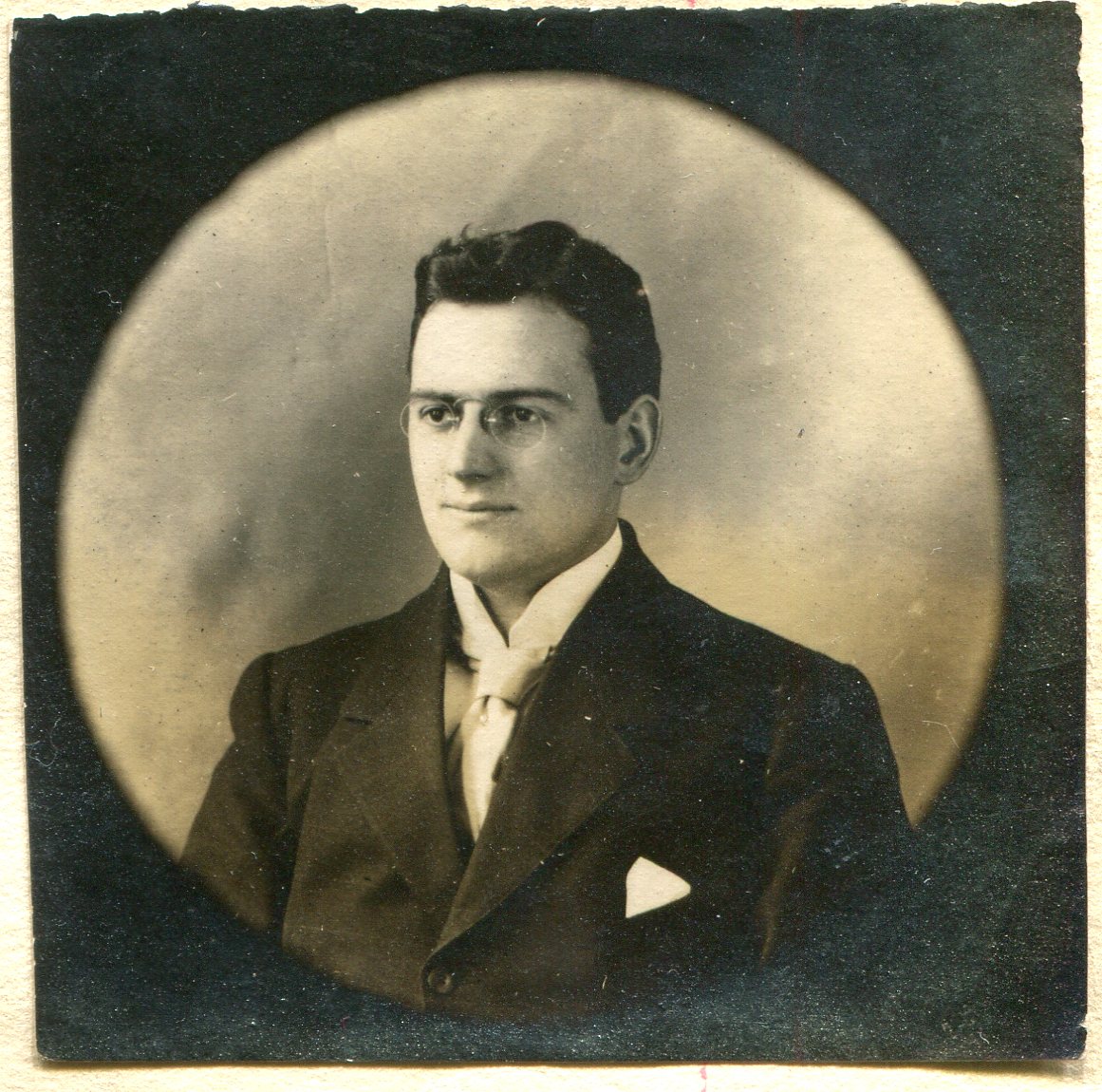 Black and white circular portrait photograph of a man wearing pince-nez ...