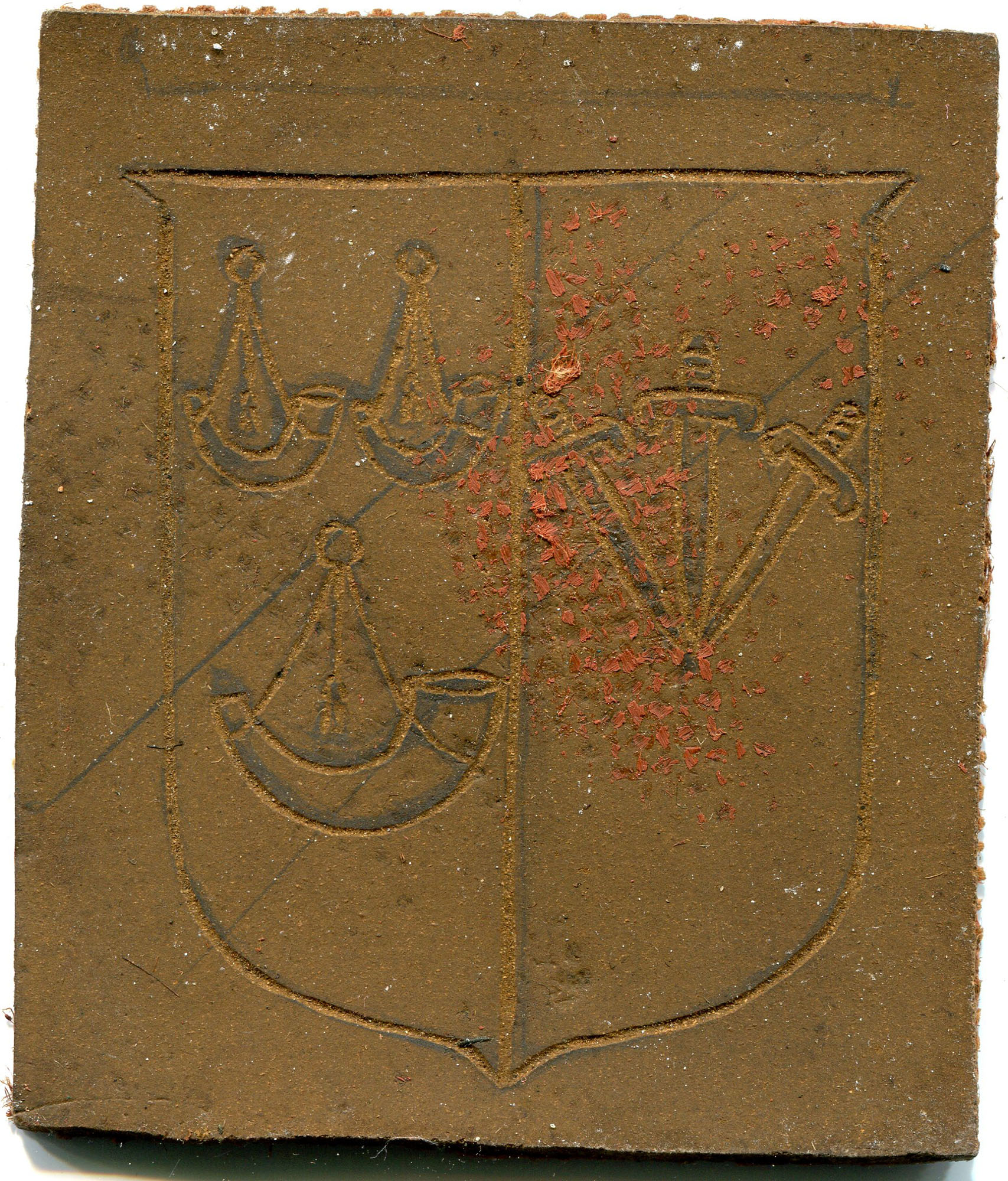 Rectangle shaped linocut with red/brown coloured backing. Reverse image ...